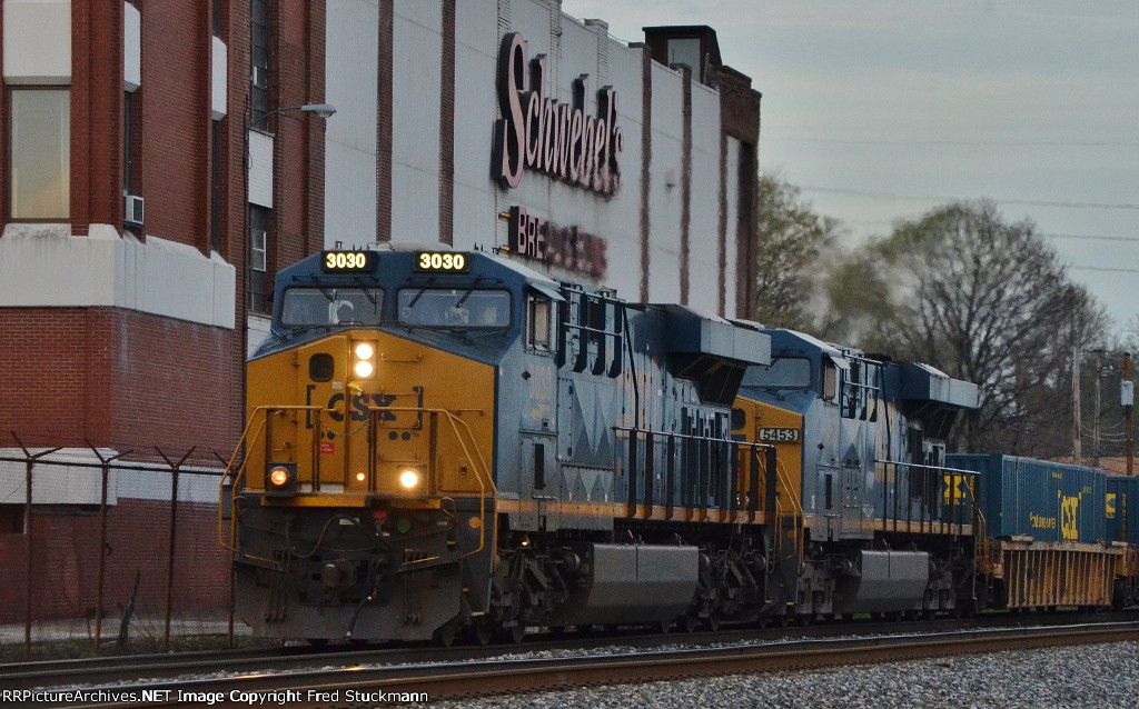 CSX 3030 & 5453 head toward the sunrise.